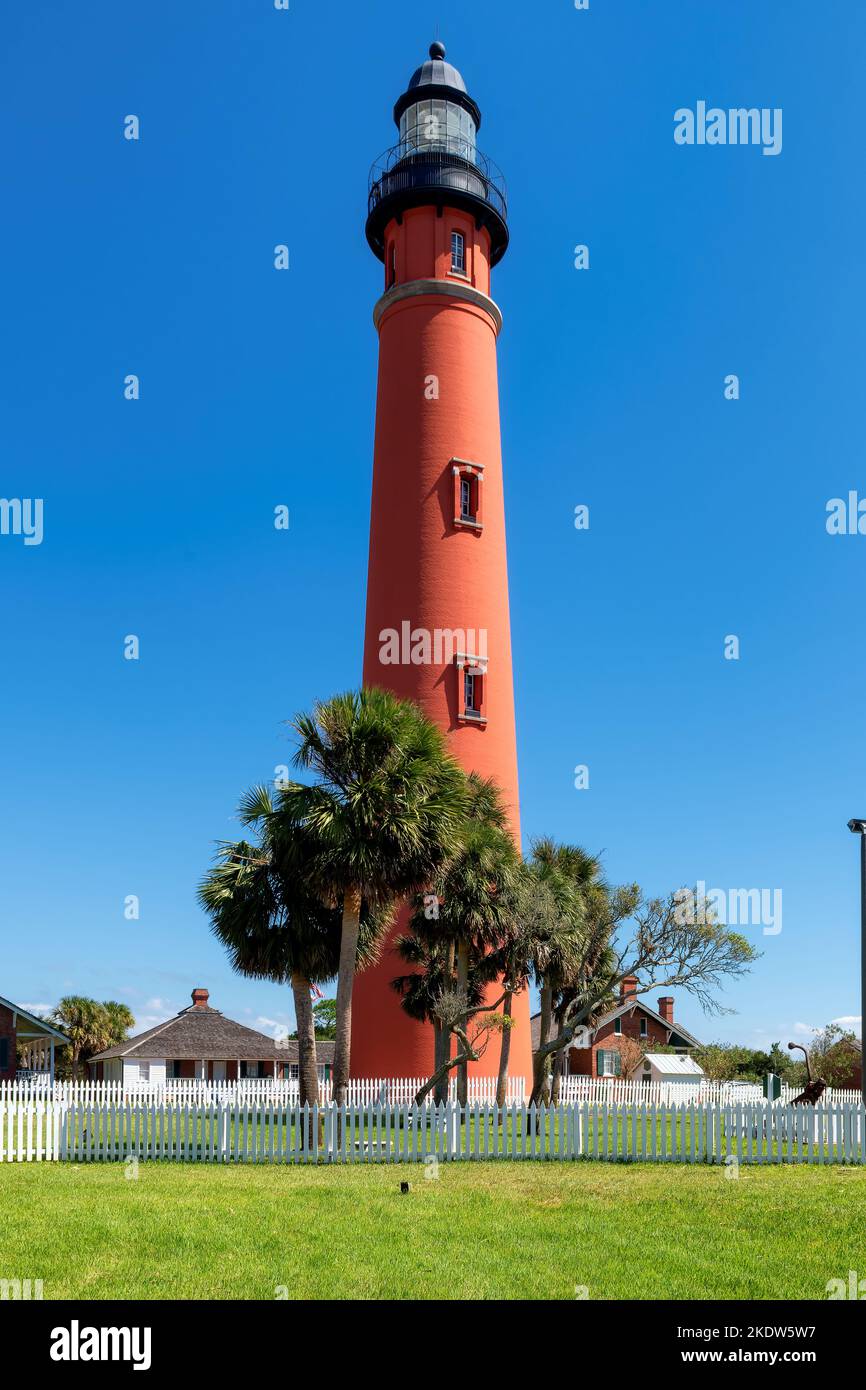 Ponce de Leon Inlet Lighthouse and palm trees around in Daytona Beach ...