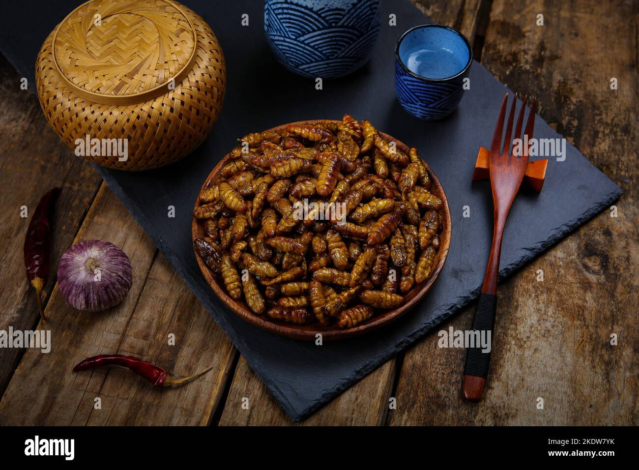 Deep fried silkworm hi-res stock photography and images - Alamy