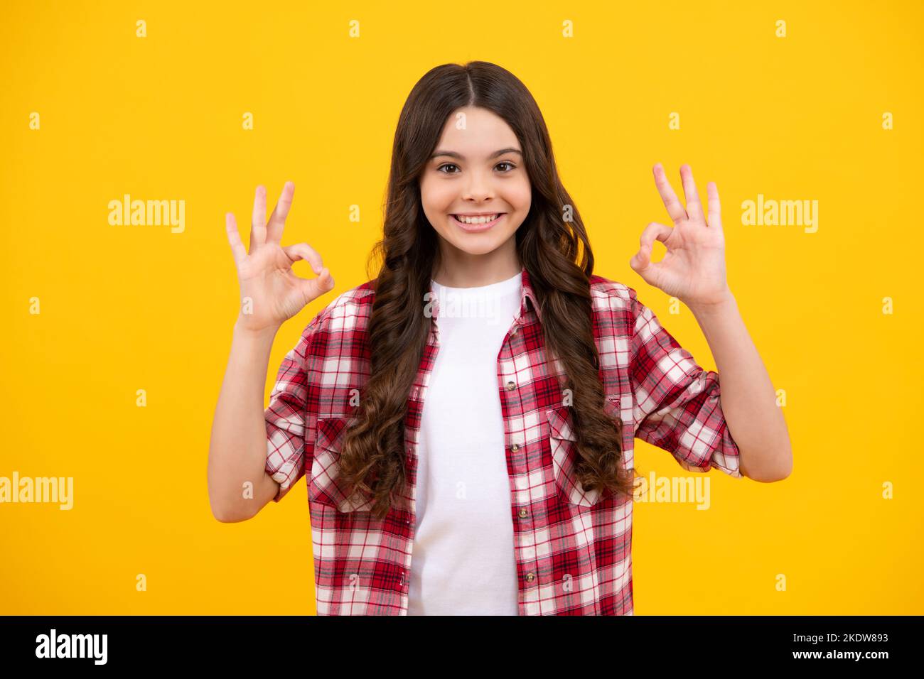 Emotional portrait of caucasian teen girl. Funny teenager making ok ...