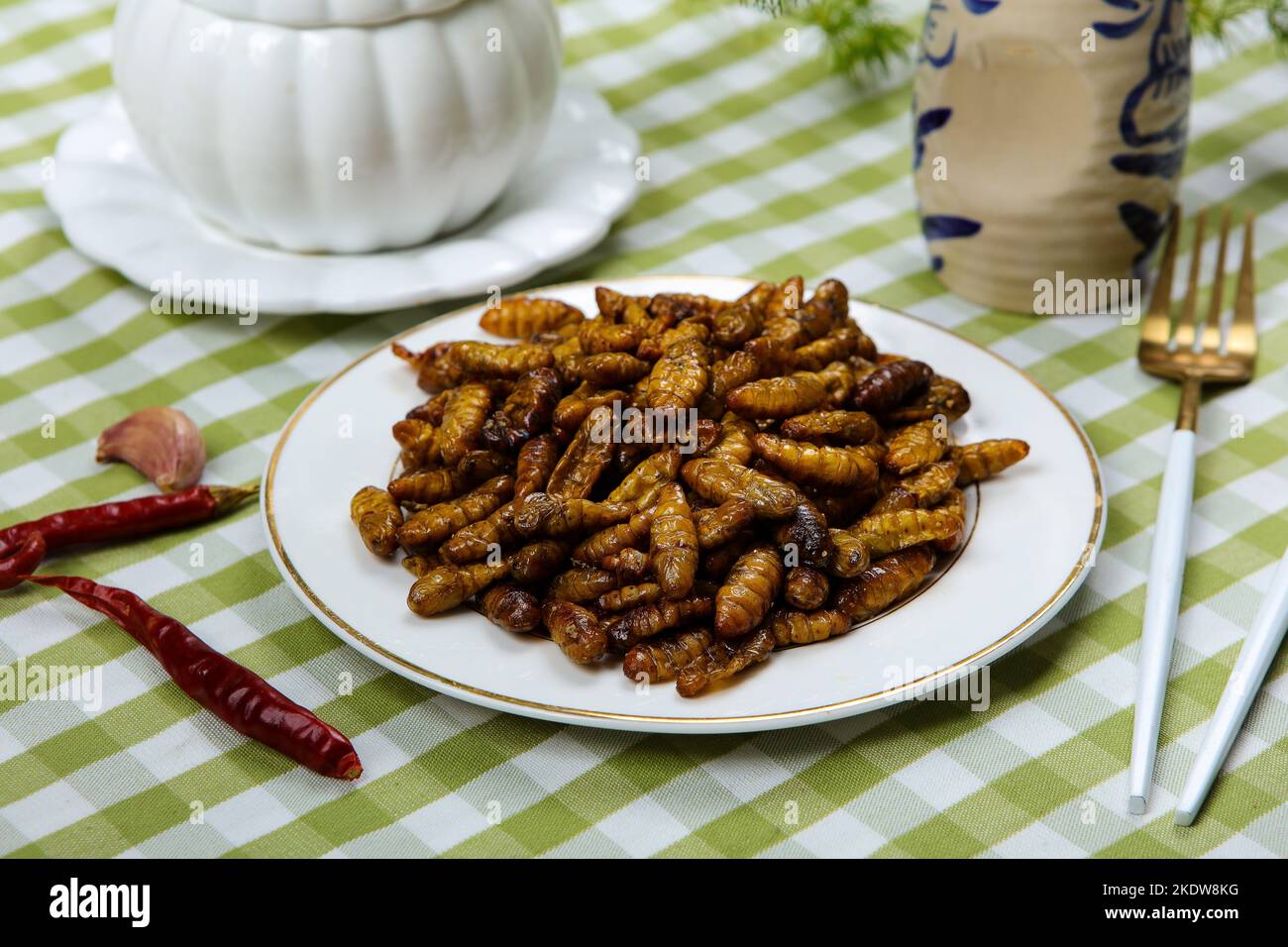 Deep fried silkworm hi-res stock photography and images - Alamy