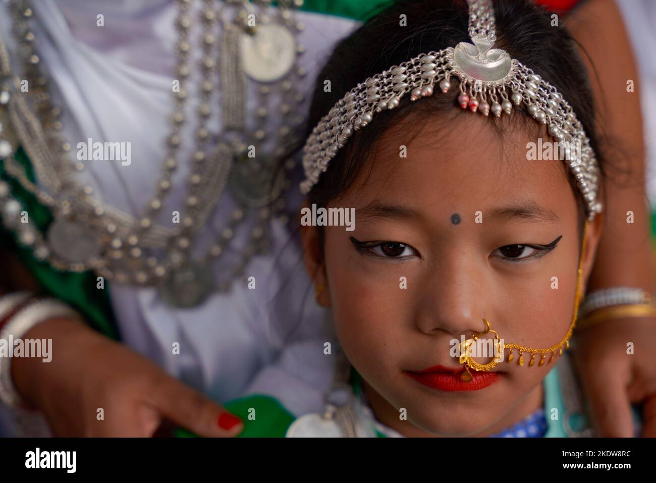 Kathmandu, Nepal. 8th Nov, 2022. A girl from the Tharu community takes ...