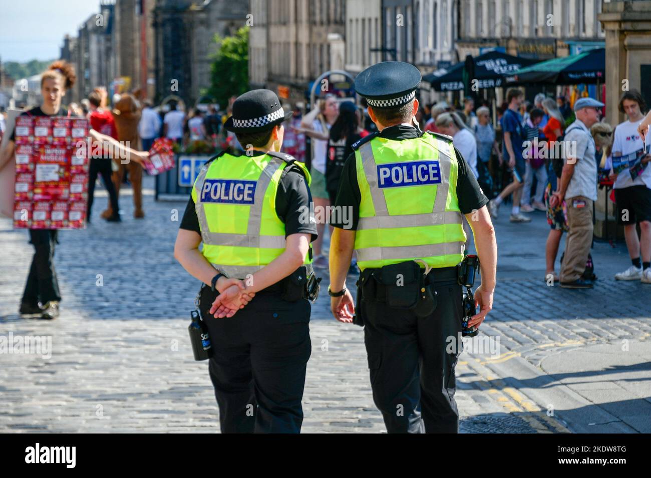 Police Scotland Male & Female Officers Patrolling The Royal Mile During ...