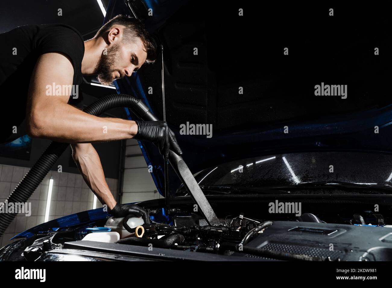 Process of drying car engine after washing with water and chemical ...
