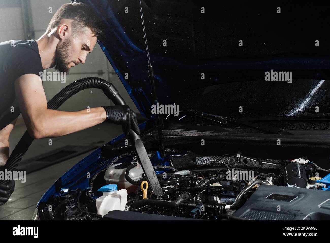 Process of drying car engine after washing with water and chemical ...