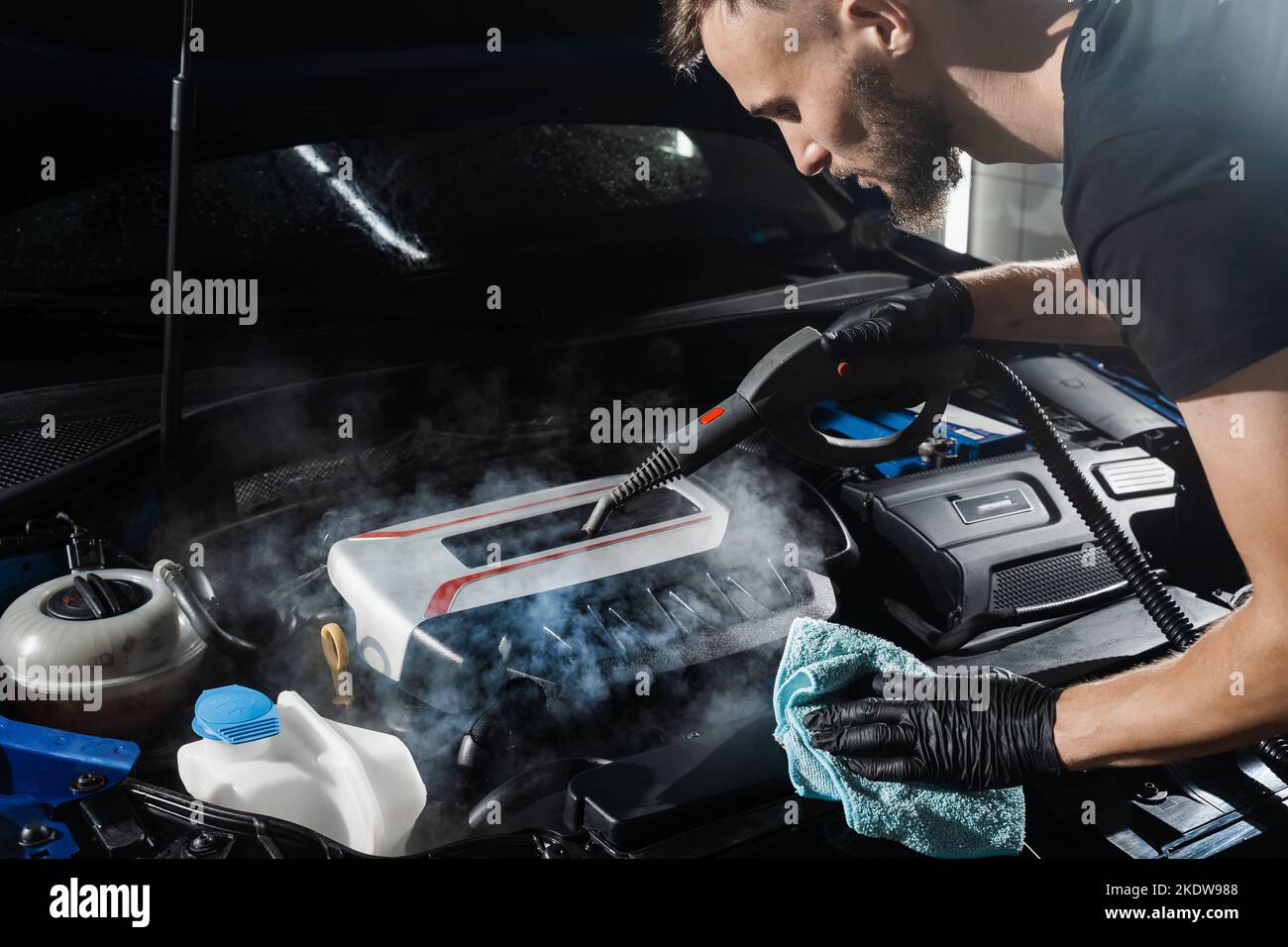 Process of drying car engine after washing with water and chemical ...
