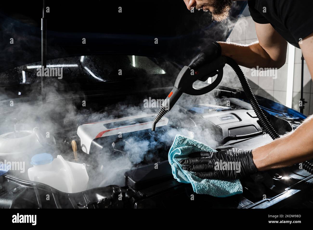 Process of drying car engine after washing with water and chemical ...