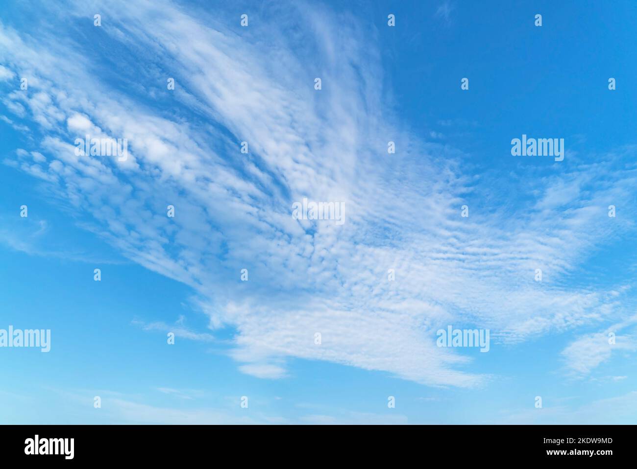 Cirrus and cumulus clouds in a blue sky Stock Photo - Alamy