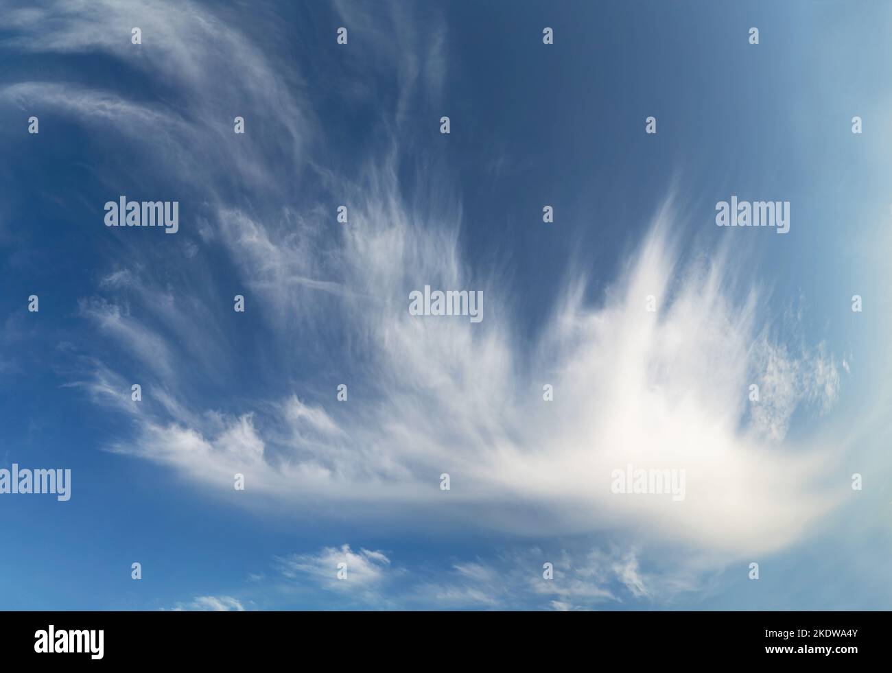 Cirrus and cumulus clouds in a blue sky Stock Photo - Alamy