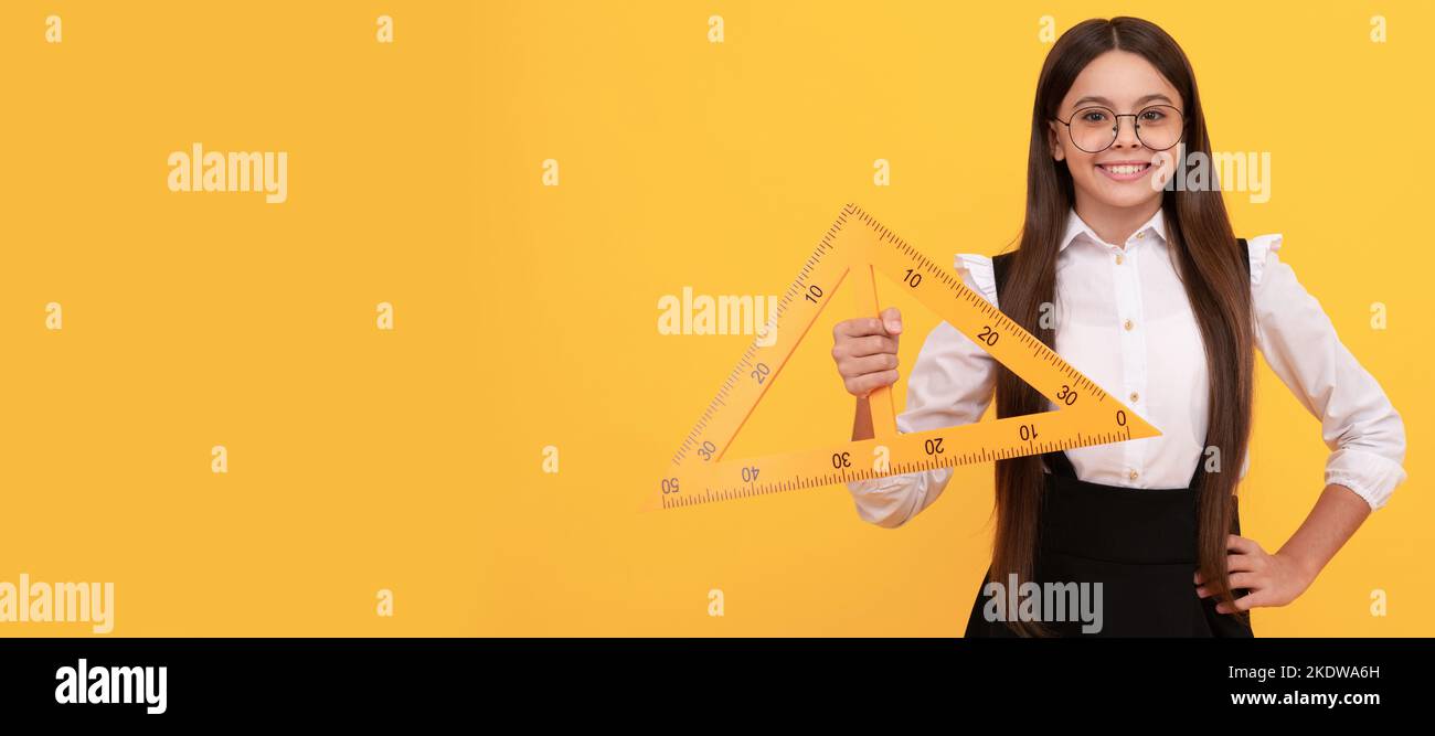 education for child. mathematics. smiling teen girl hold triangle. back ...