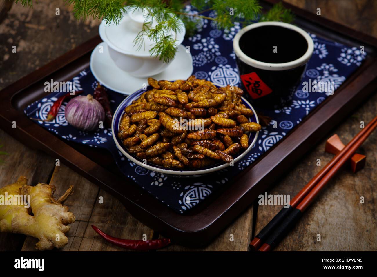 Deep fried silkworm hi-res stock photography and images - Alamy