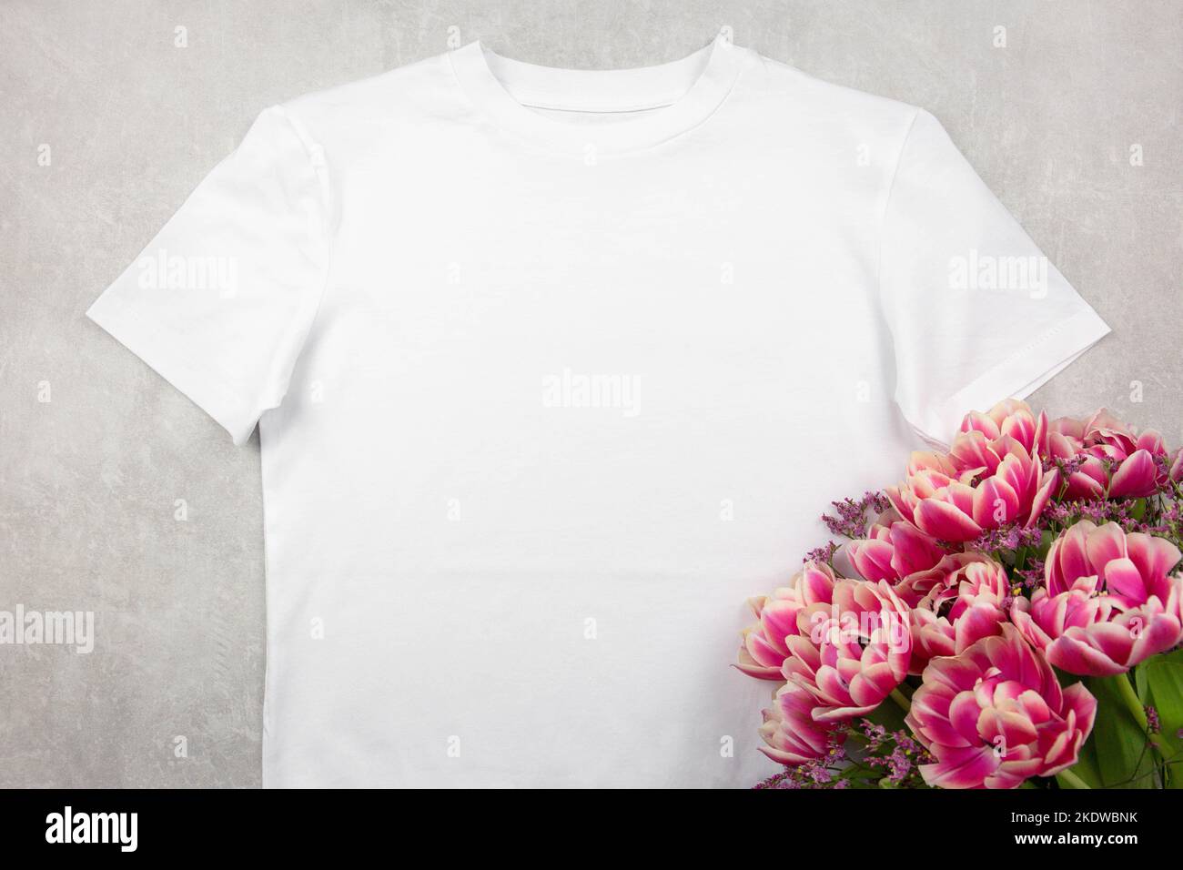 White Womens Cotton T Shirt Mockup With Pink Tulips Flowers On Gray
