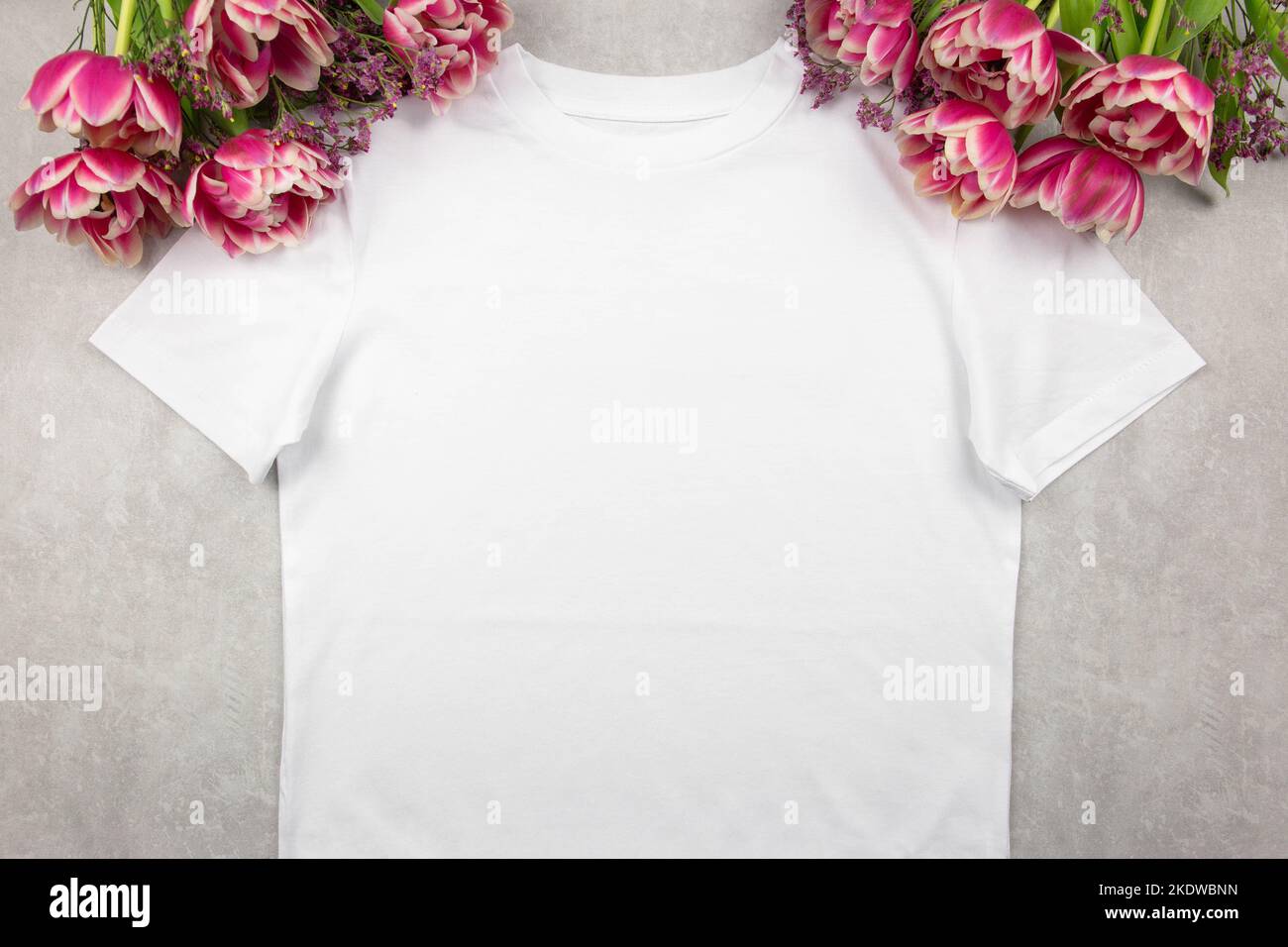 White Womens Cotton T Shirt Mockup With Pink Tulips Flowers On Gray