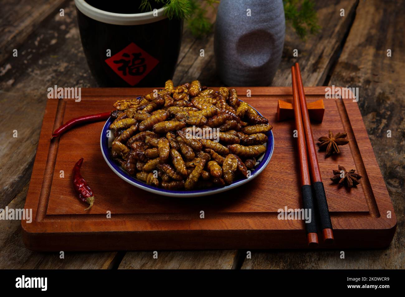 Deep fried silkworm hi-res stock photography and images - Alamy
