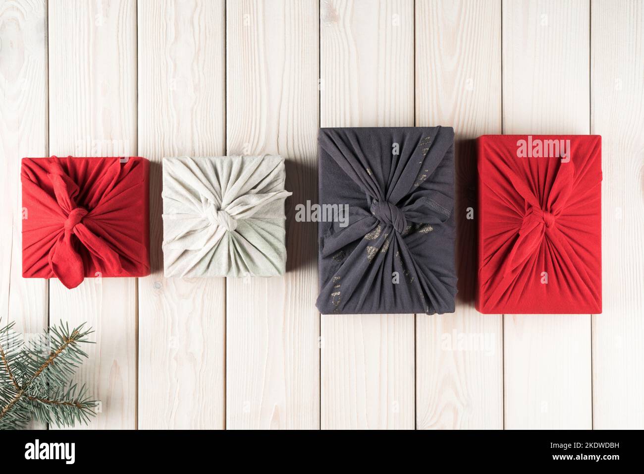 Christmas, new year composition of four reusable, fabric furoshiki ...