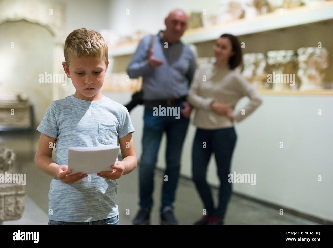 Family visiting museum Stock Photo - Alamy