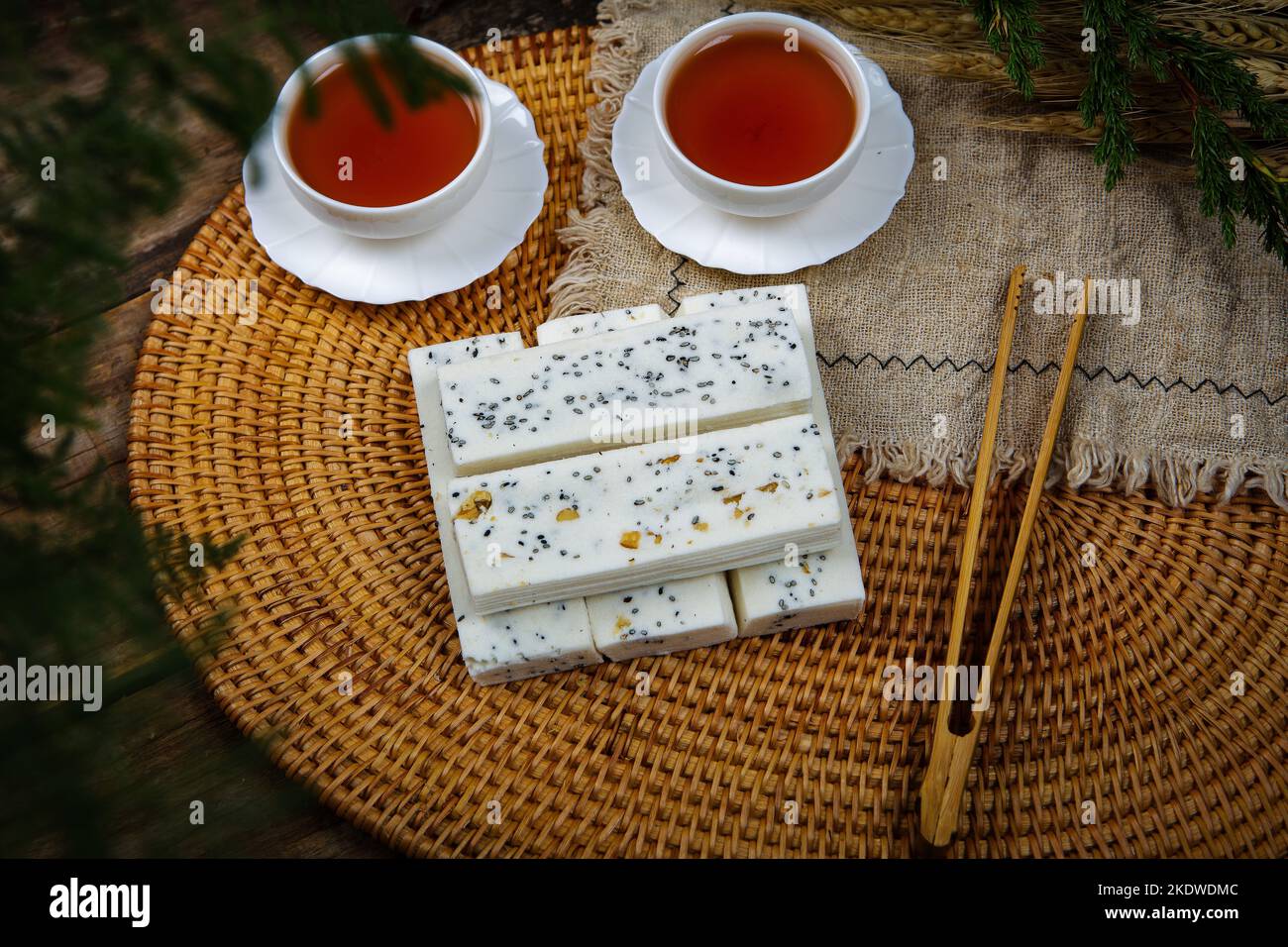 A small amount of delicious white square rice cake Stock Photo - Alamy