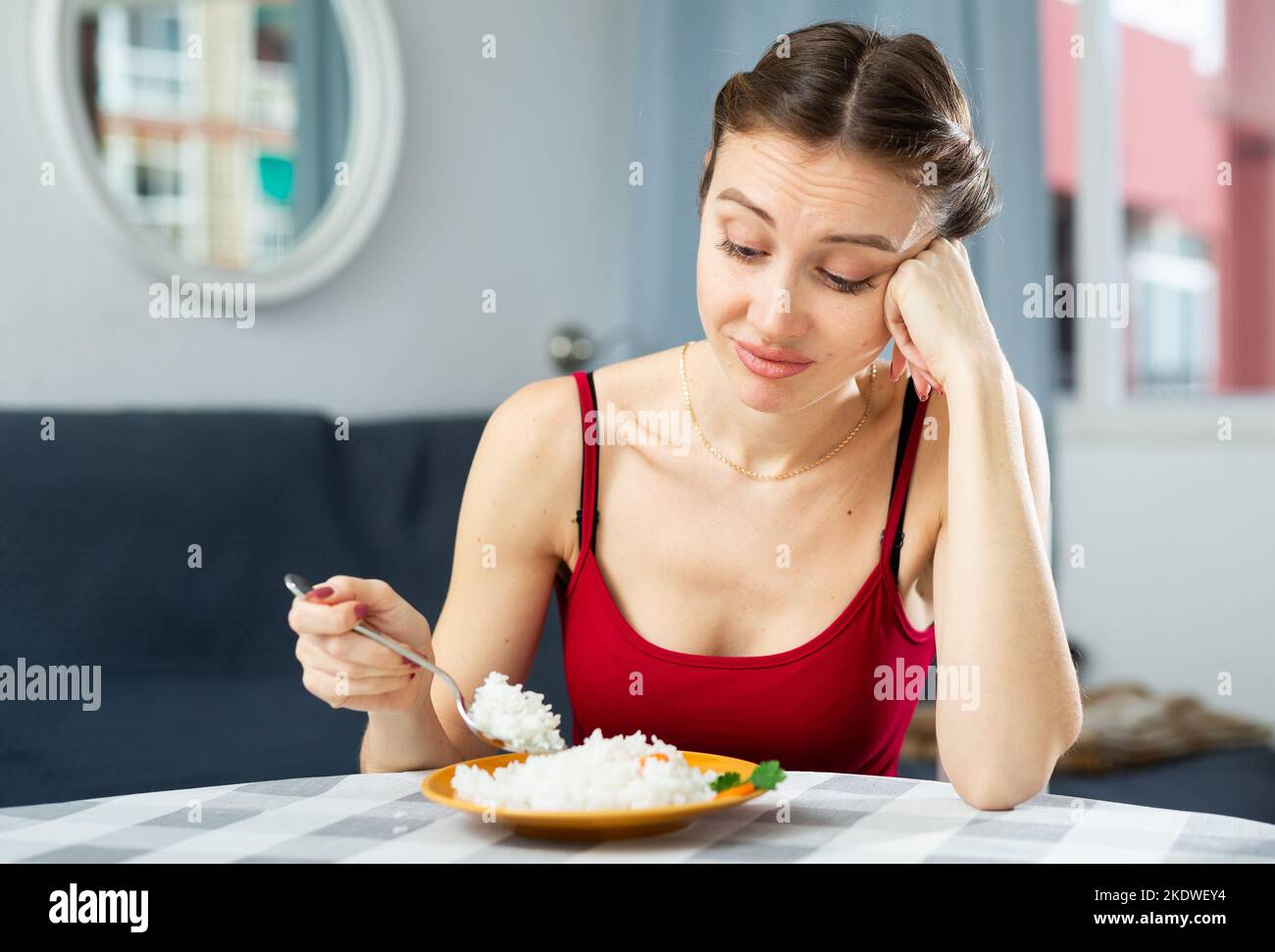Sad person eating foods hi-res stock photography and images - Alamy