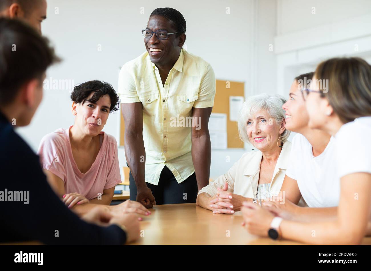 Group of people attending language course Stock Photo - Alamy