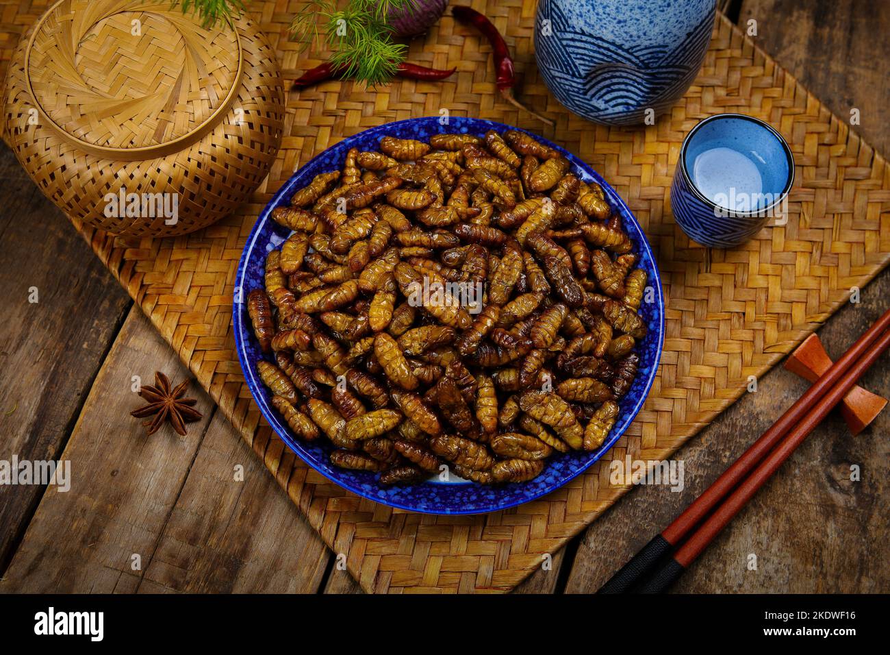 Deep fried silkworm hi-res stock photography and images - Alamy