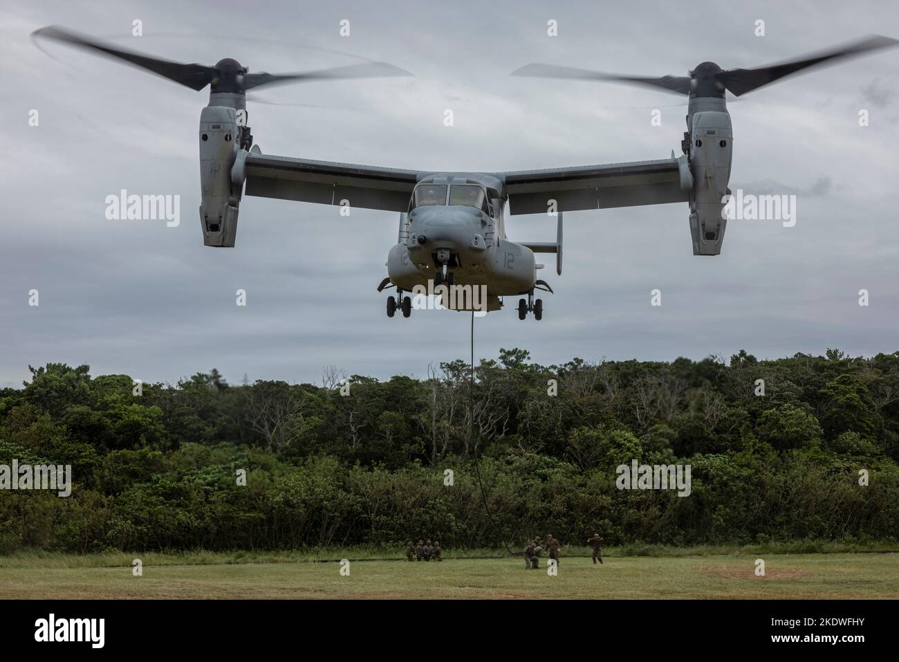 U.S. Marines with III Marine Expeditionary Force (MEF) fast rope from ...
