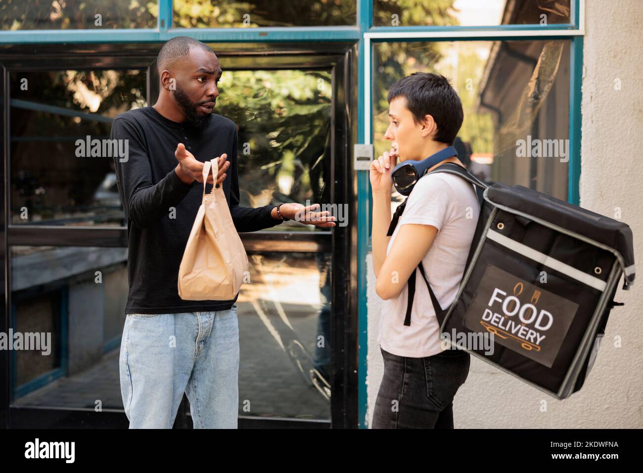 Food delivery bad service, unsatisfied client holding order package ...