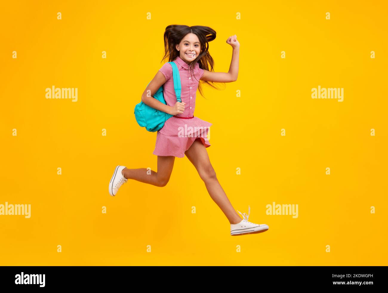 Schoolgirl in school uniform with backpack. Teenage girl student on ...