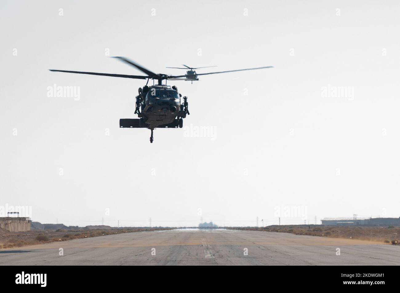 Two U.S. Air Force HH-60G Pave Hawks assigned to the 46th Expeditionary ...