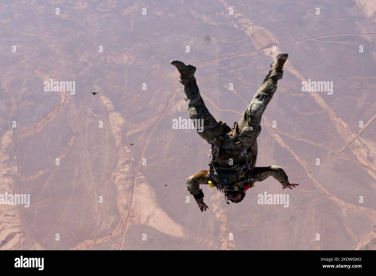 A U.S. Air Force Pararescue Jumper performs military free fall jump ...