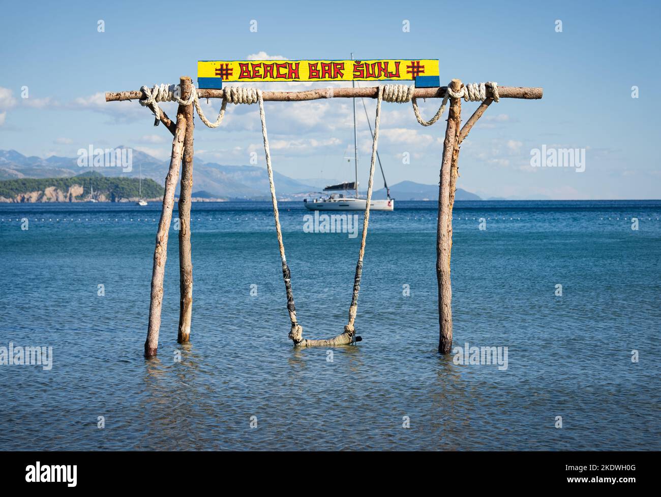 Water swing on Sunj Beach, Lopud Island Stock Photo - Alamy