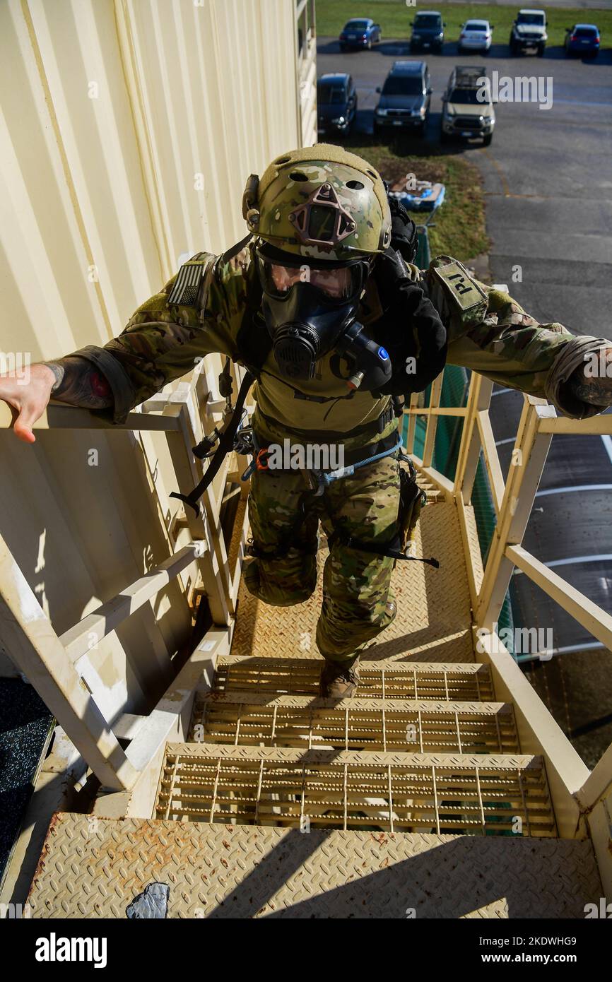 A pararescueman assigned to the 57th Rescue Squadron ascends a ...