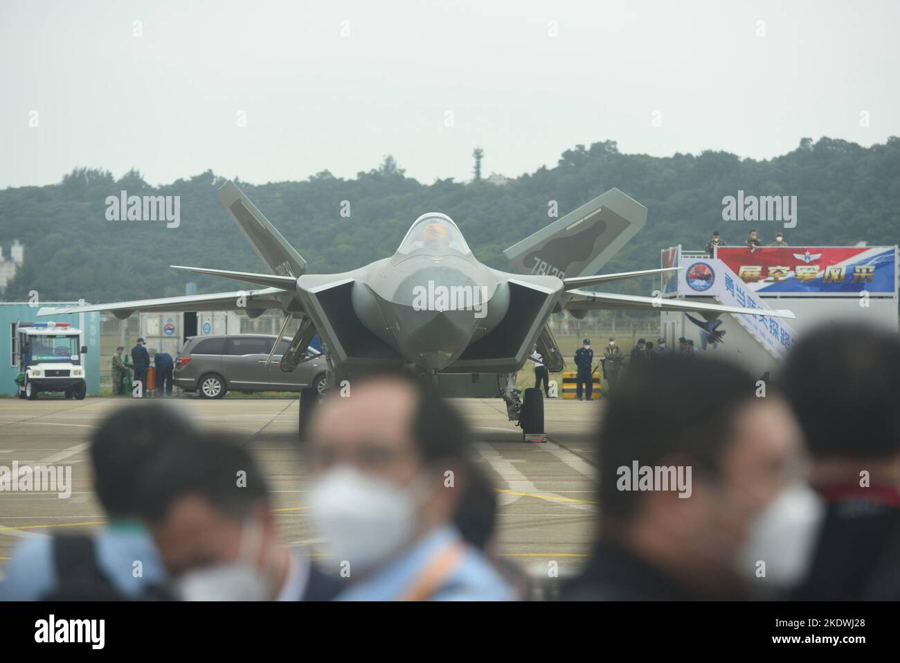 ZHUHAI, CHINA - NOVEMBER 8, 2022 - Visitors look at the Chengdu J-20 ...