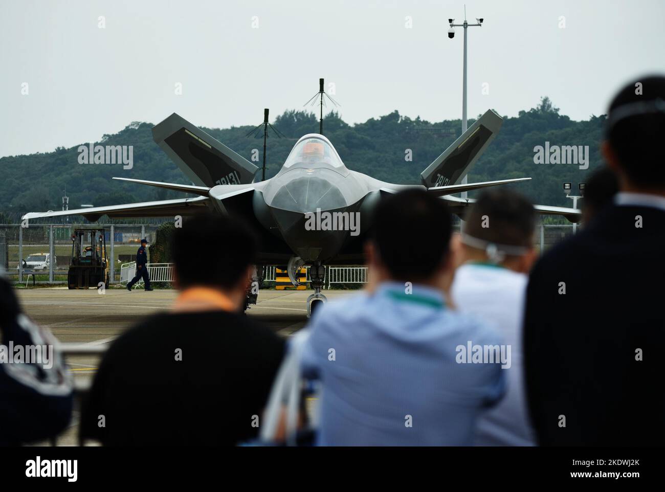 ZHUHAI, CHINA - NOVEMBER 8, 2022 - Visitors look at the Chengdu J-20 ...