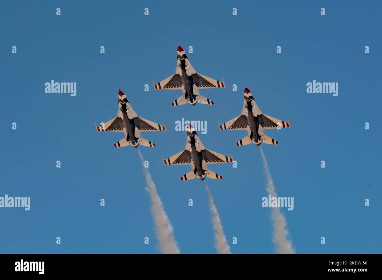 Four F-16 Fighting Falcon fighter jets assigned to the U.S. Air Force ...