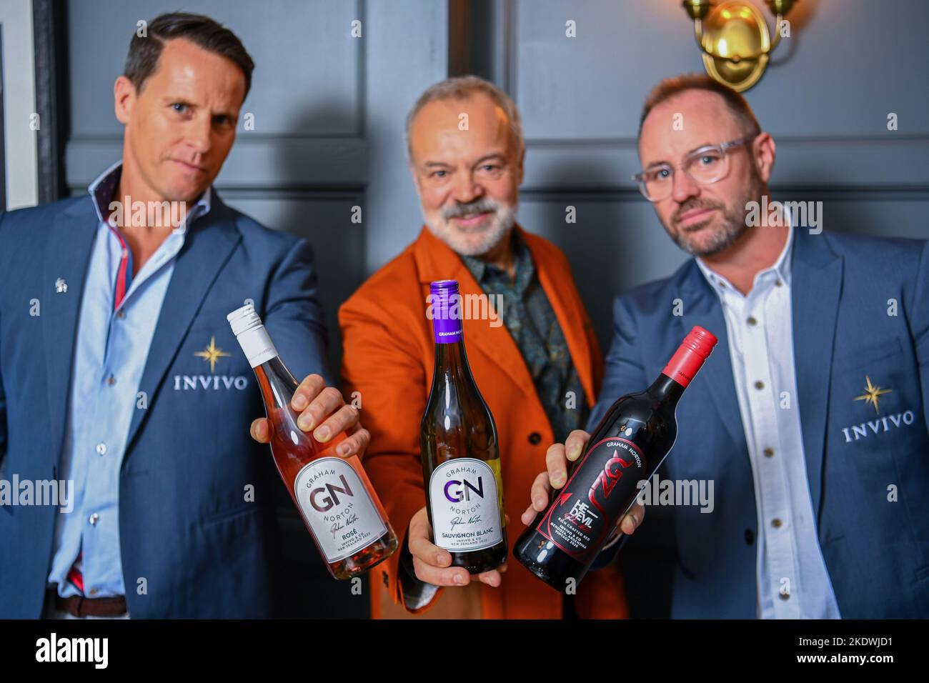 EDITORIAL USE ONLY Graham Norton (centre) with Invivo Co-founders, Tim ...