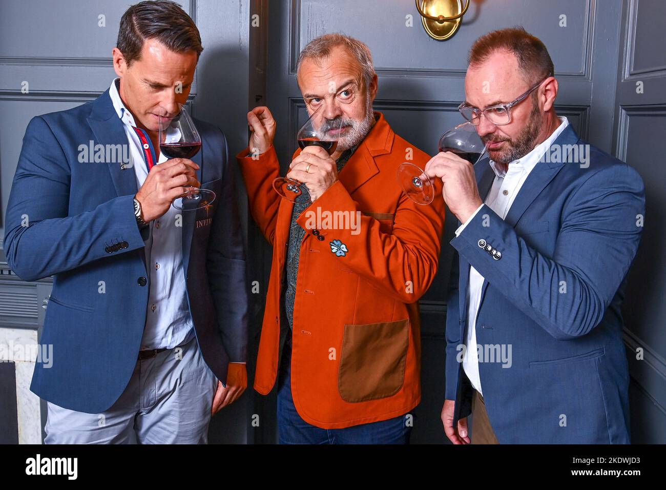 EDITORIAL USE ONLY Graham Norton (centre) with Invivo Co-founders, Tim ...