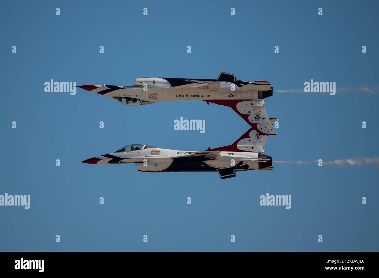 Two F-16 Fighting Falcon fighter jets assigned to the U.S. Air Force ...