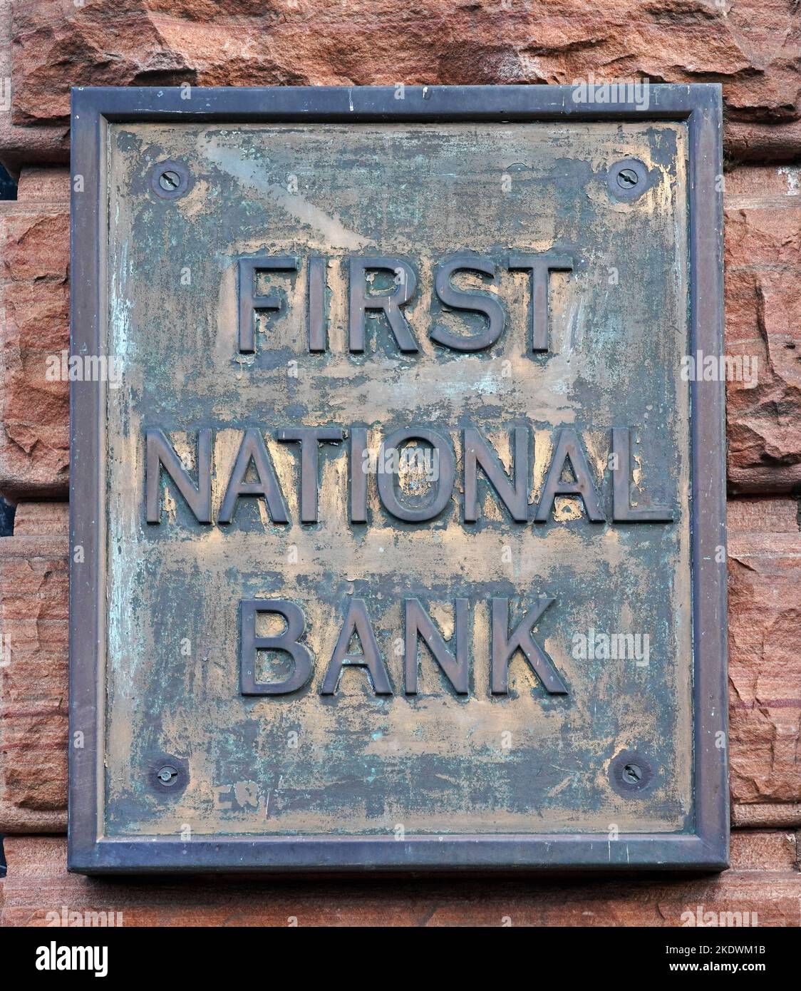 Metal plaque on old bank building, generic bank name Stock Photo - Alamy