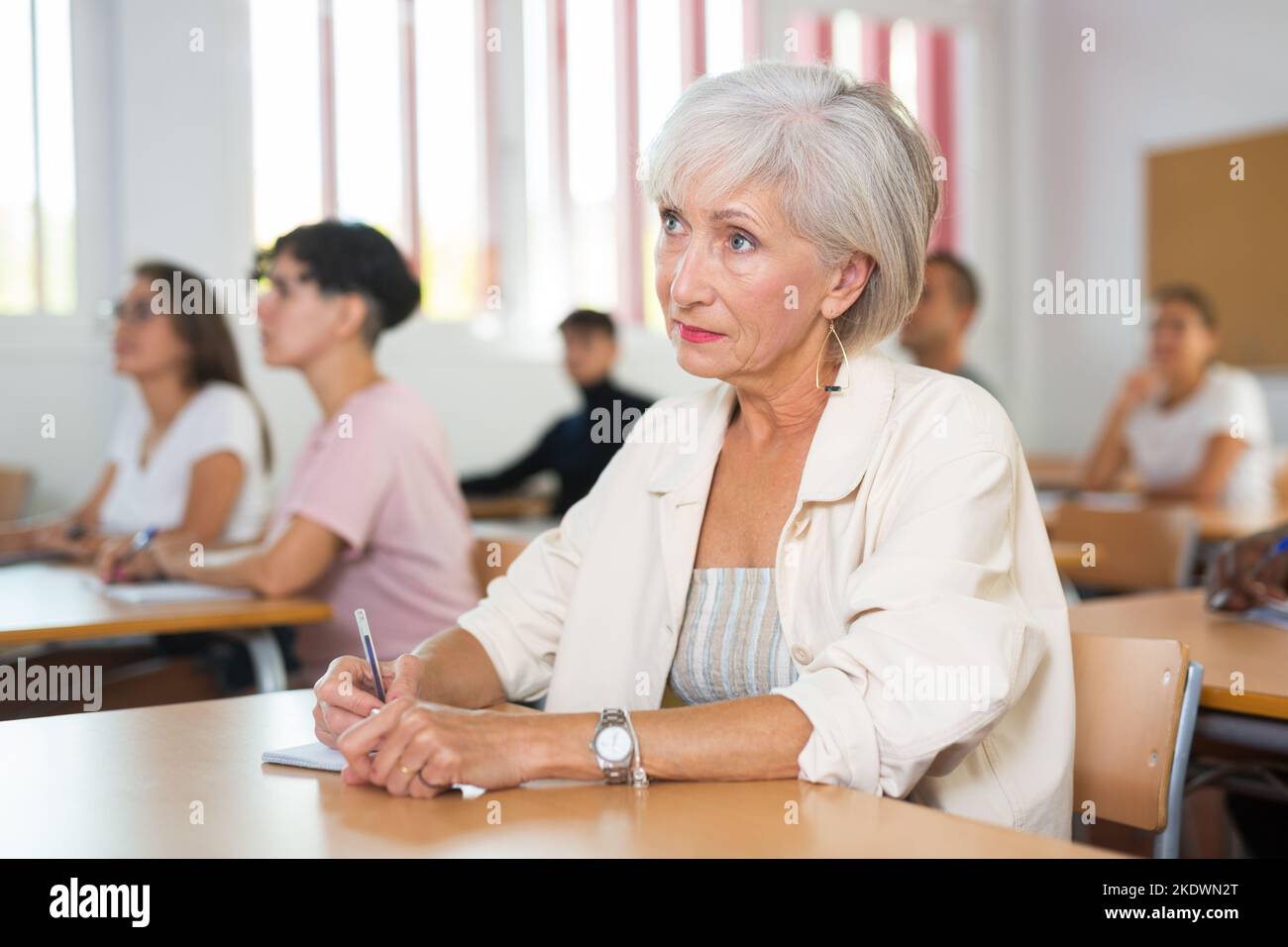 Older woman learn language hi-res stock photography and images - Alamy