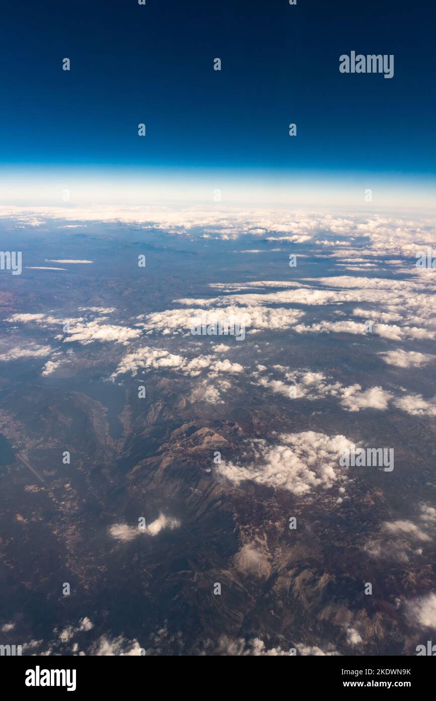 View from a airplane window at 35.000 feet high Stock Photo - Alamy