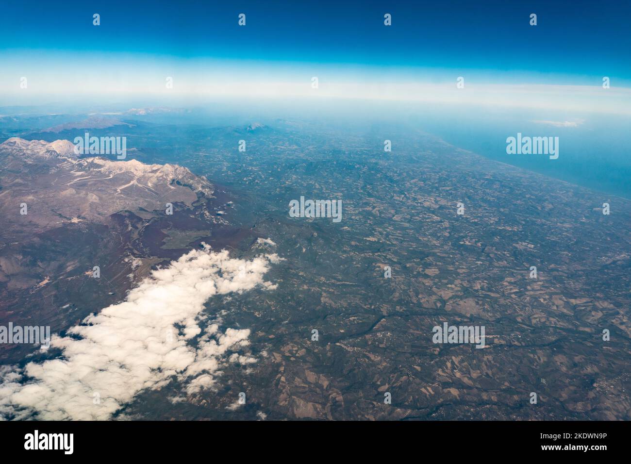 View from a airplane window at 35.000 feet high Stock Photo - Alamy