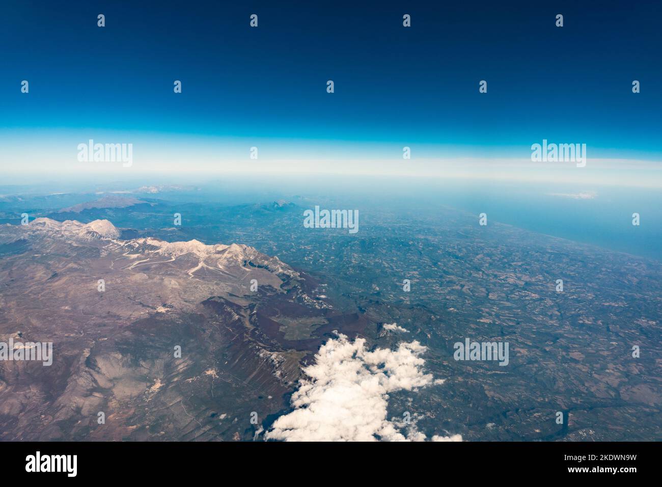 View from a airplane window at 35.000 feet high Stock Photo - Alamy