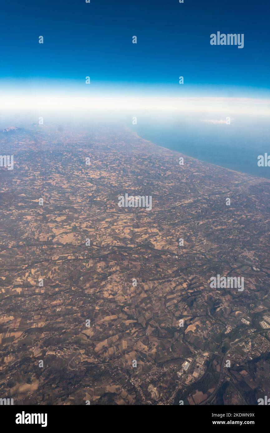 View from a airplane window at 35.000 feet high Stock Photo - Alamy