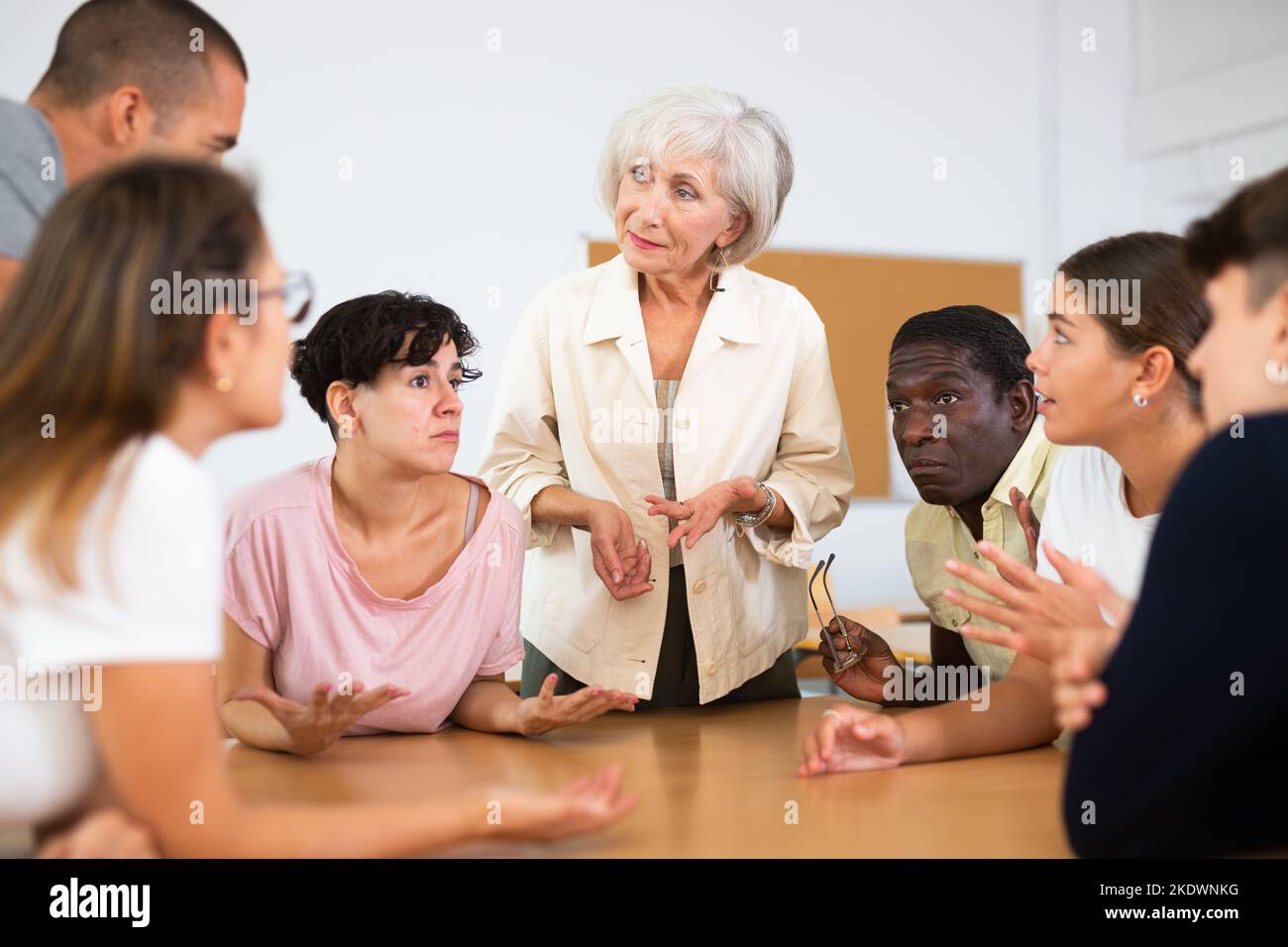 Group people attending language hi-res stock photography and images - Alamy