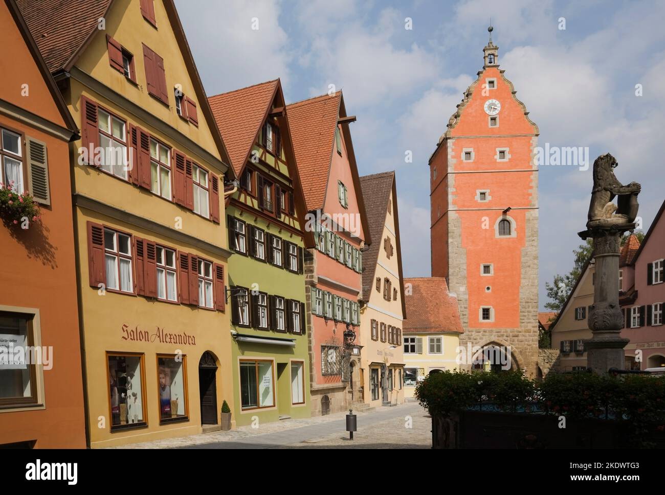 Commercial and residential apartment buildings with clock tower in the ...