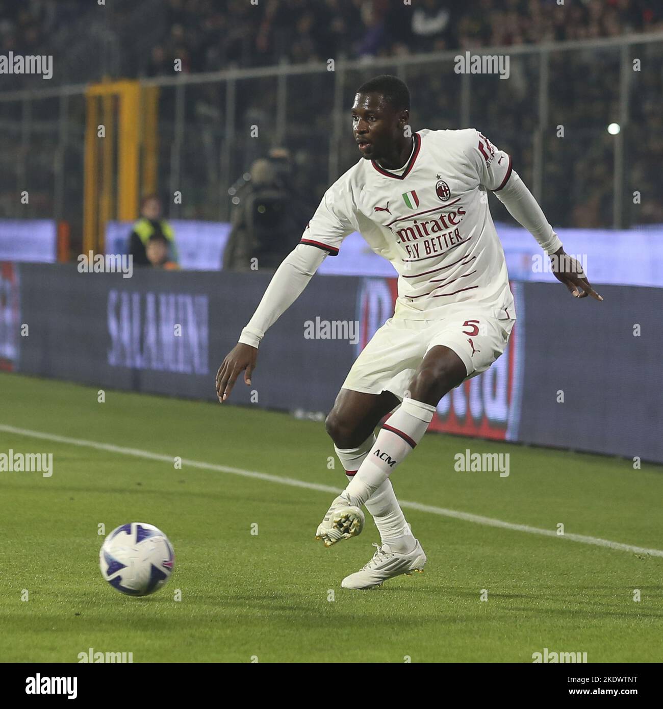 Fode Ballo-Toure of AC Milan play the ball during US Cremonese vs AC ...