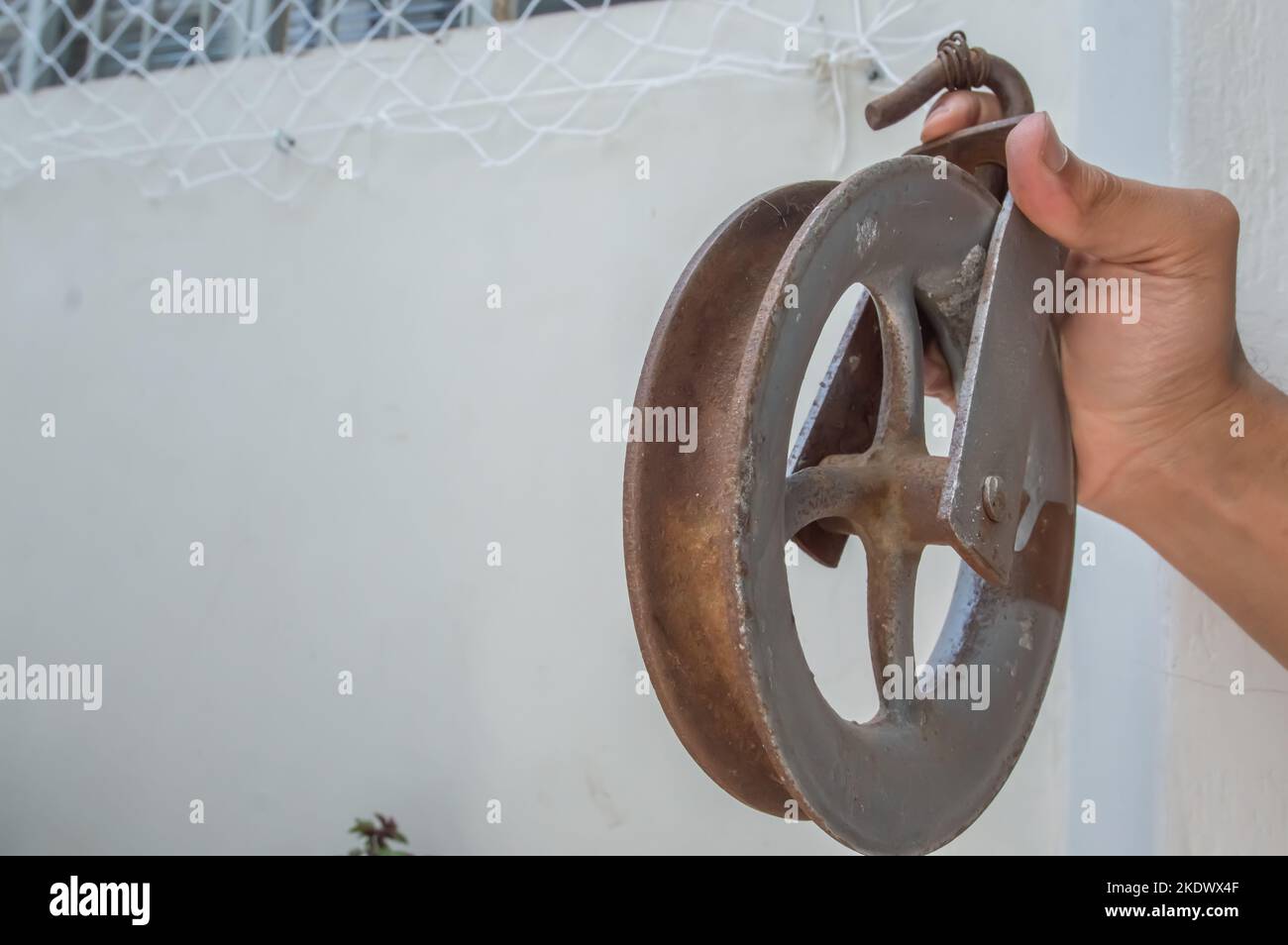 Ancient wooden pulleys hi-res stock photography and images - Alamy