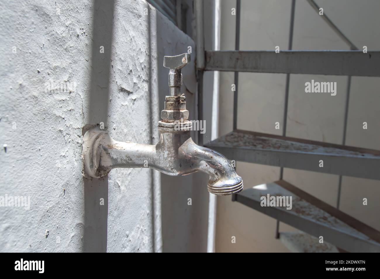 Old and closed faucet with copy space left and natural light Stock ...