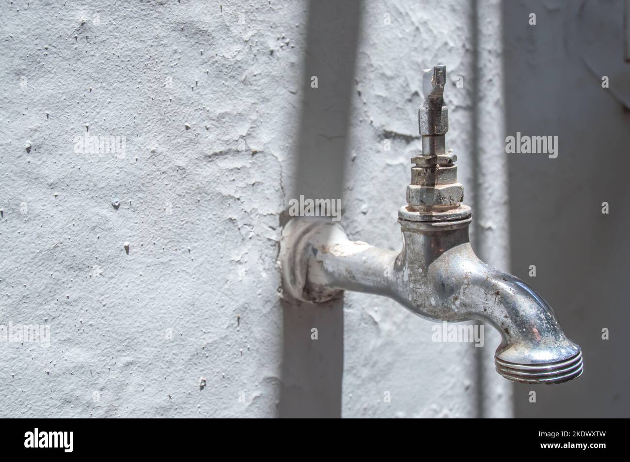 Old and closed faucet with copy space left and natural light Stock ...