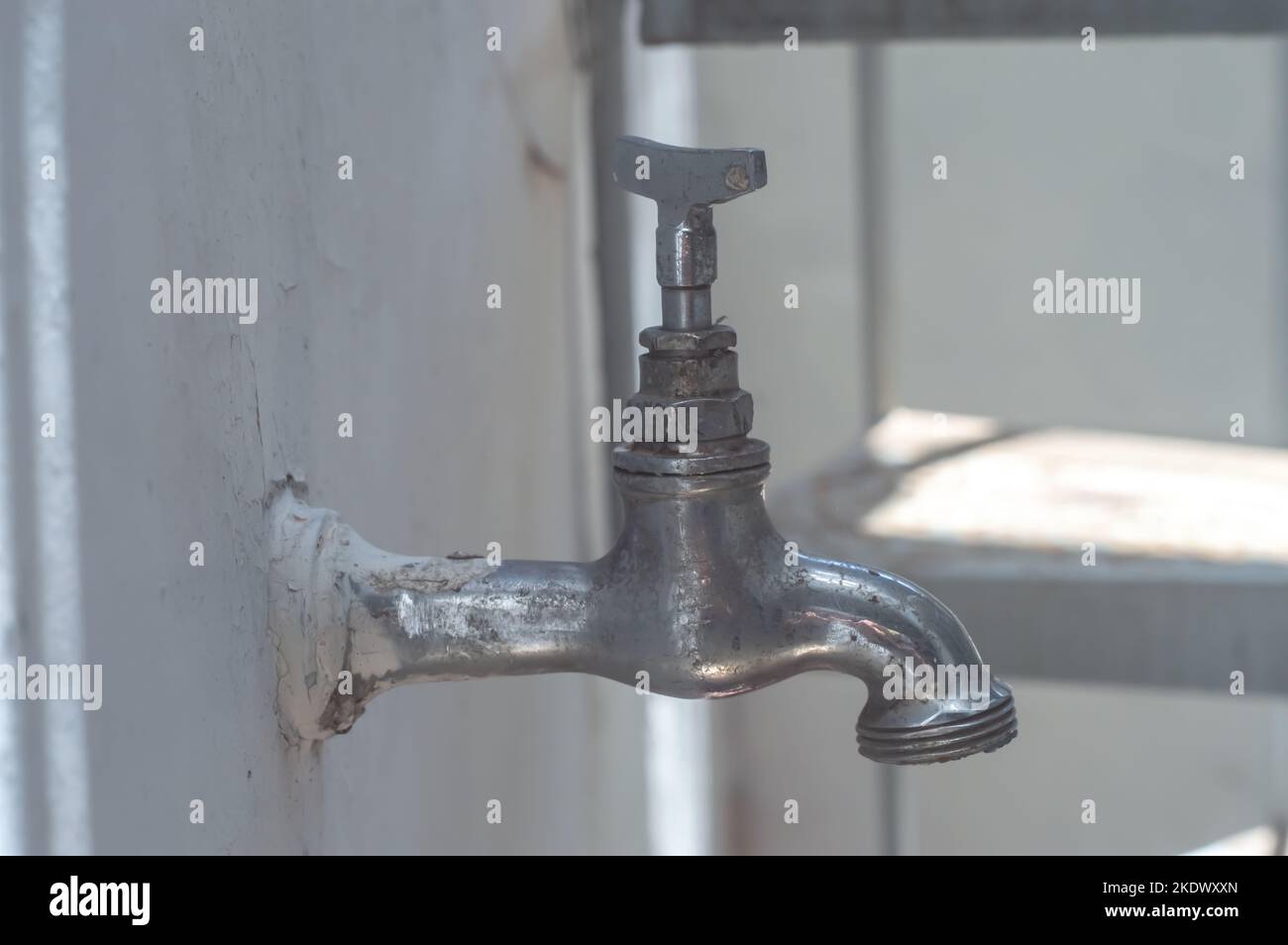 Old and closed faucet with copy space left and natural light Stock ...