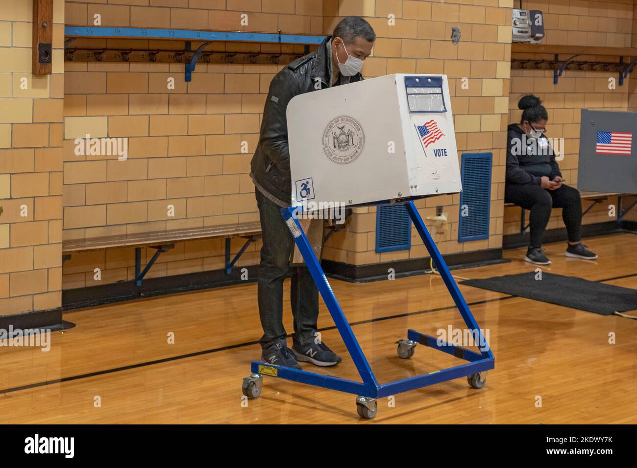 NEW YORK, NY - NOVEMBER 08: People cast their vote on Election Day at a ...